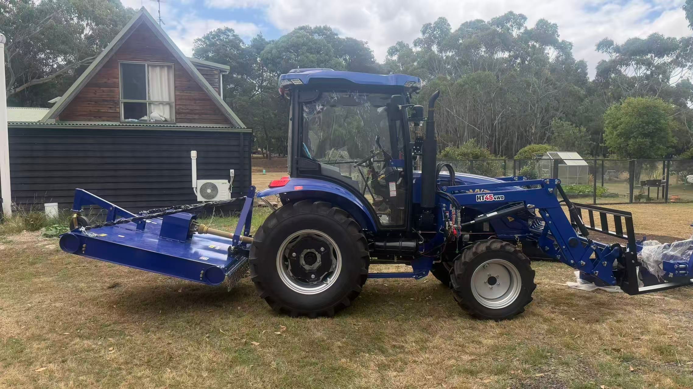New 45-HP Handymax Tractor Delivered with Slasher Attachment – HANDYMAX
